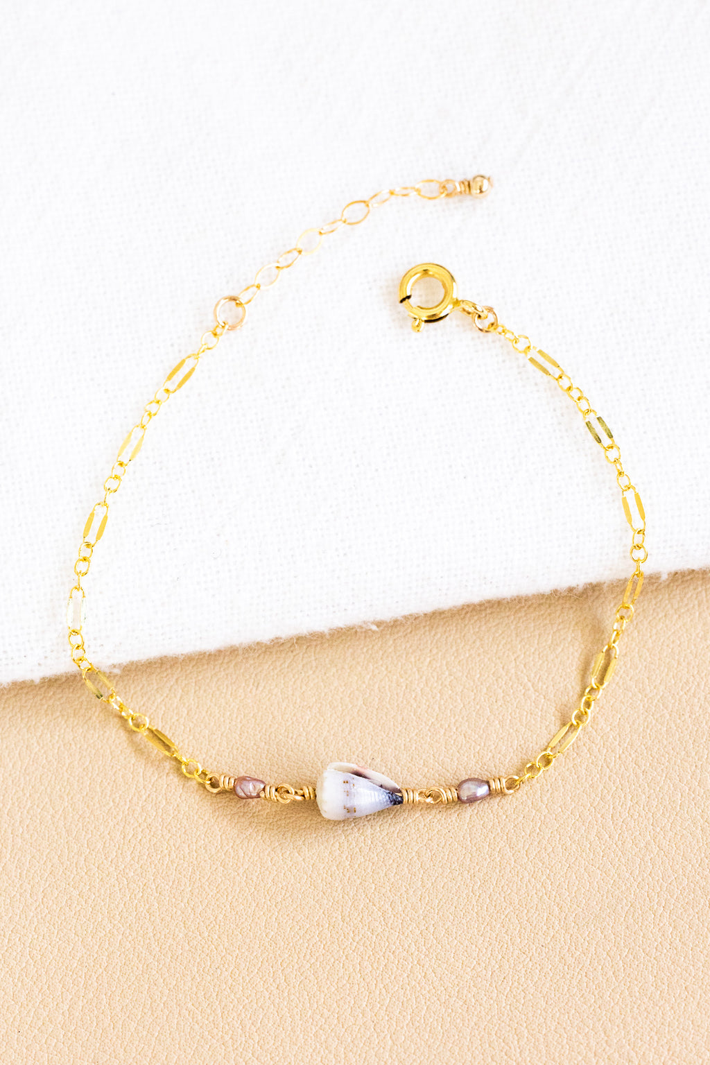 Dark Pink Pearl & Brown/Indigo Dwarf Cone Princess Bracelet – Laine ...